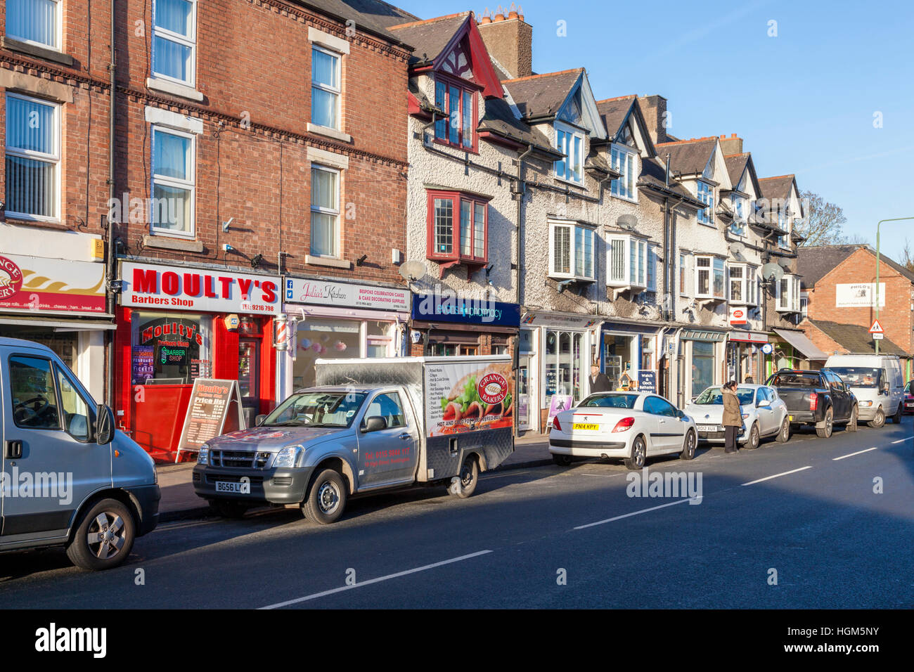 Shops on the High Street in the village of Ruddington, Nottinghamshire ...