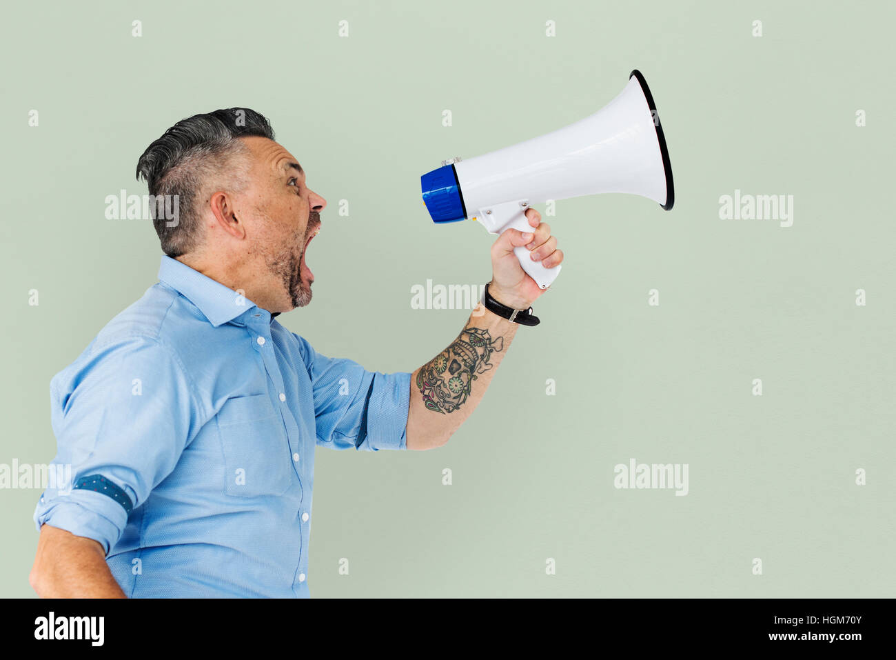 Man Holding Megaphone Studio Concept Stock Photo - Alamy