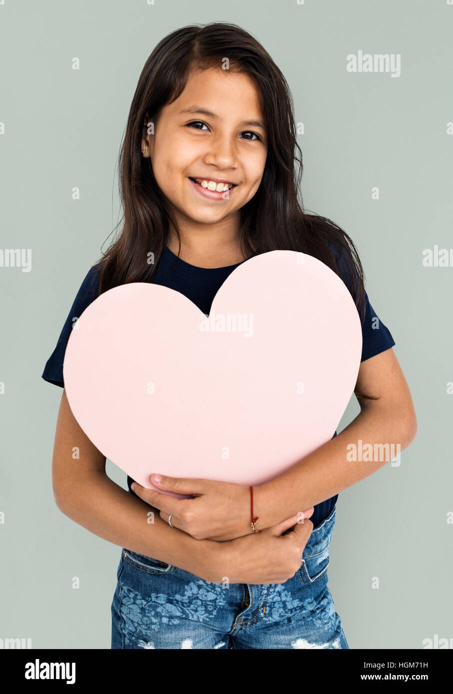 Little Girl Carrying Heart Concept Stock Photo - Alamy