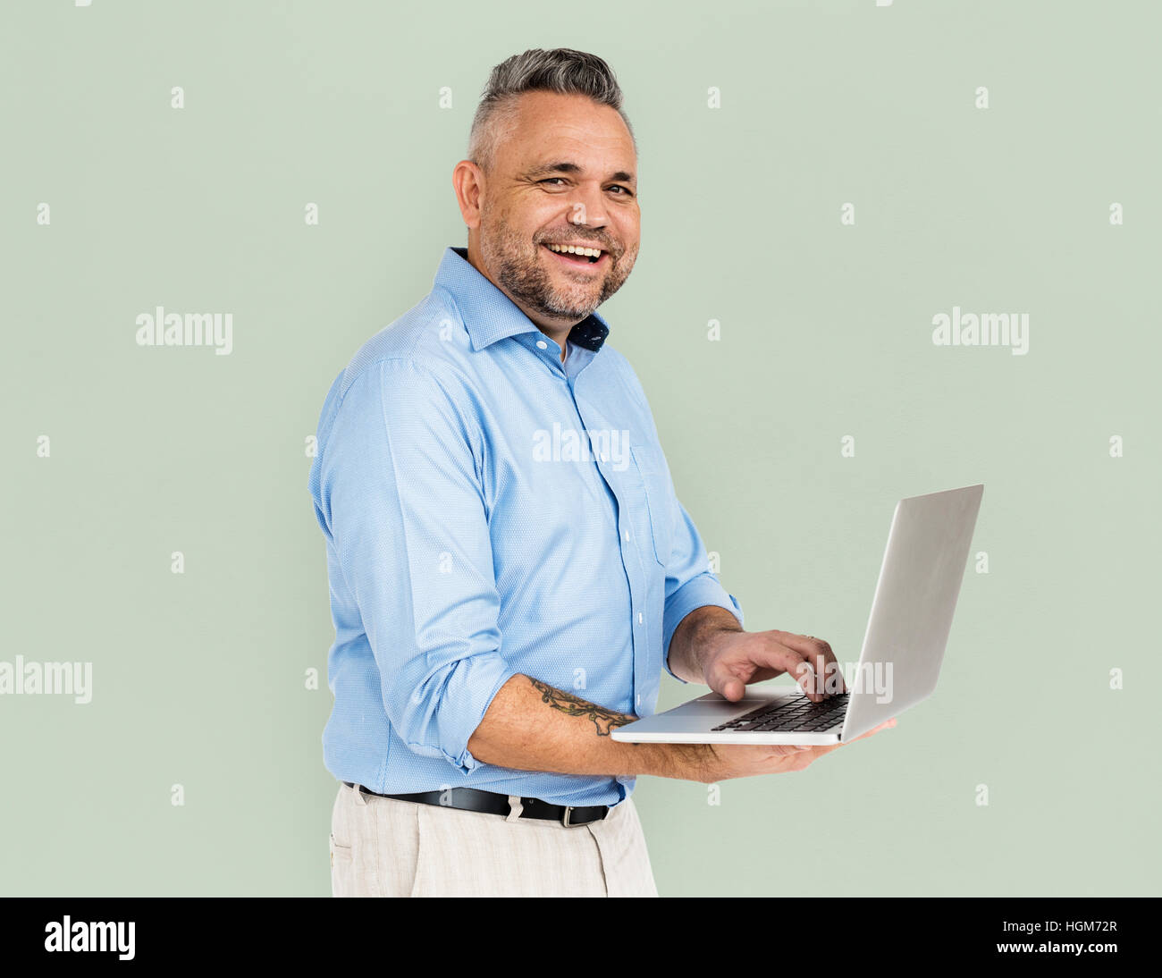 Cheerful Man Technology Gadget Concept Stock Photo - Alamy
