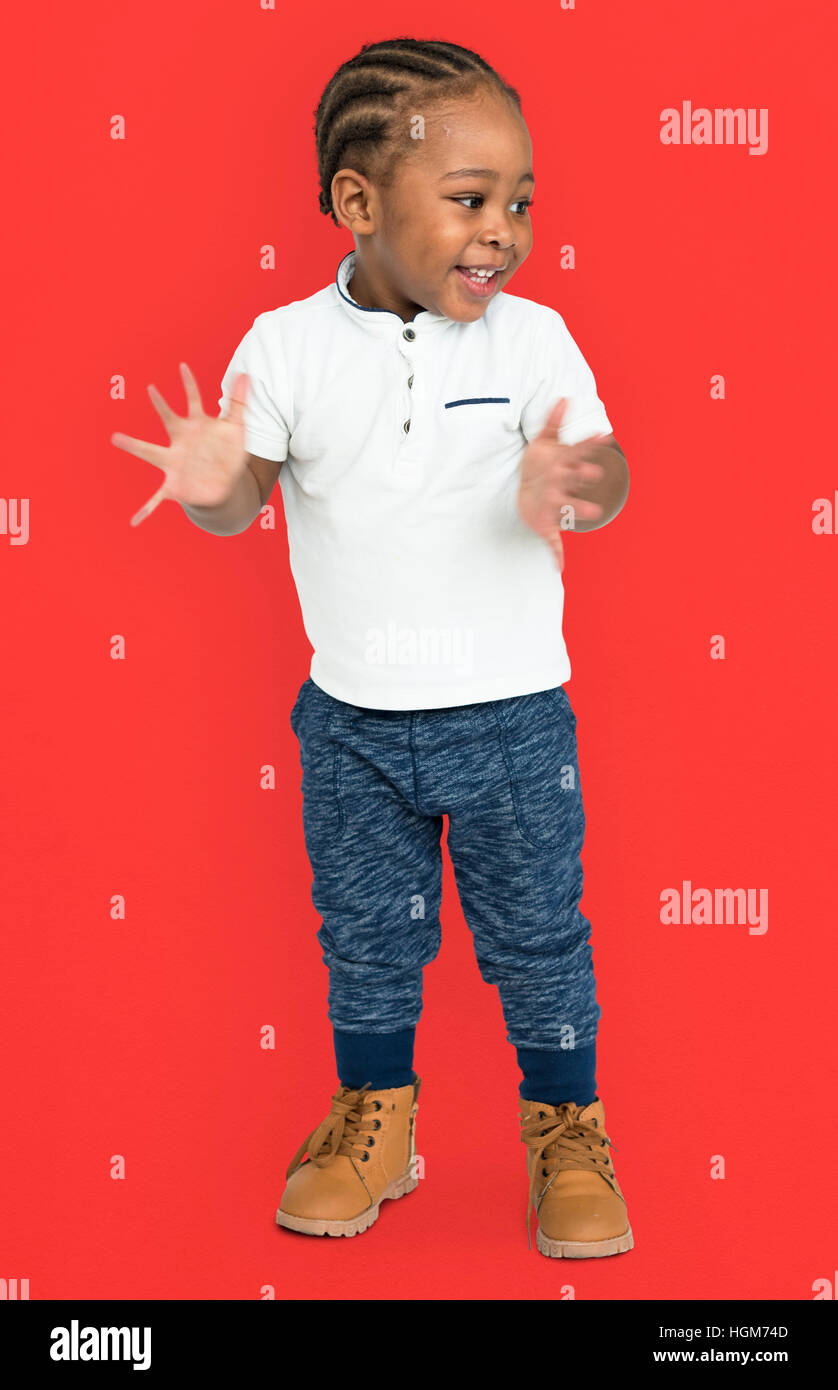 Kid Pose Standing Studio Concept Stock Photo - Alamy