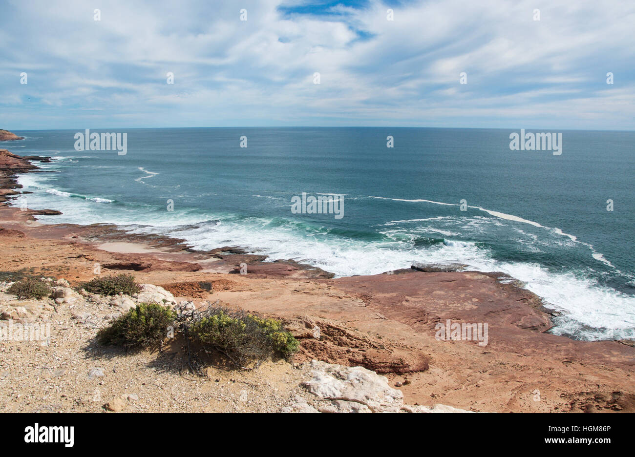 Elevated view over the eroded sandstone shoreline at Red Bluff with the ...