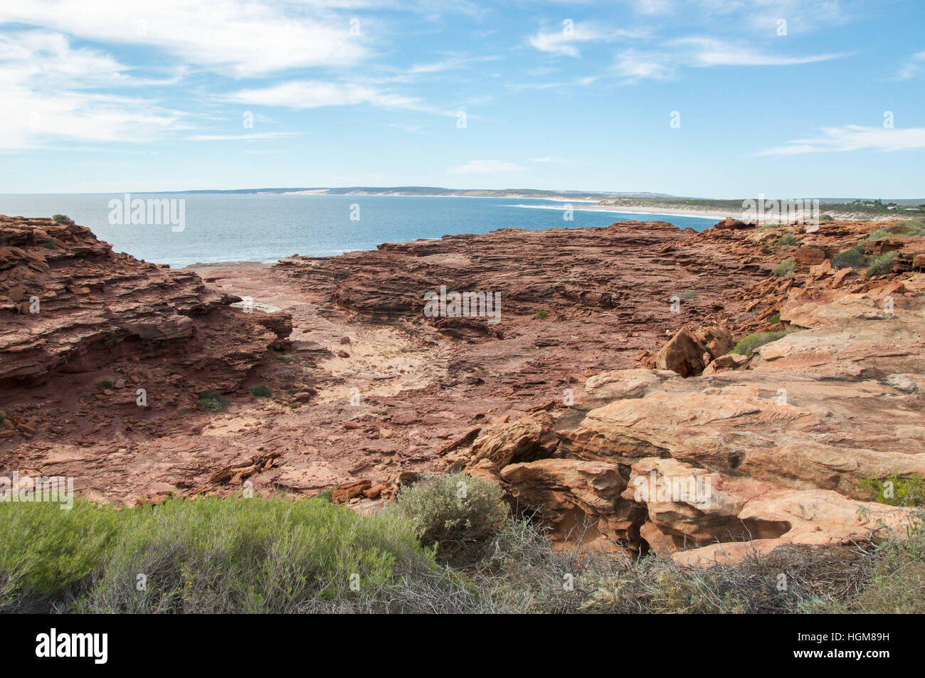 Rugged path through the red sandstone terrain at Red Bluff beach with ...