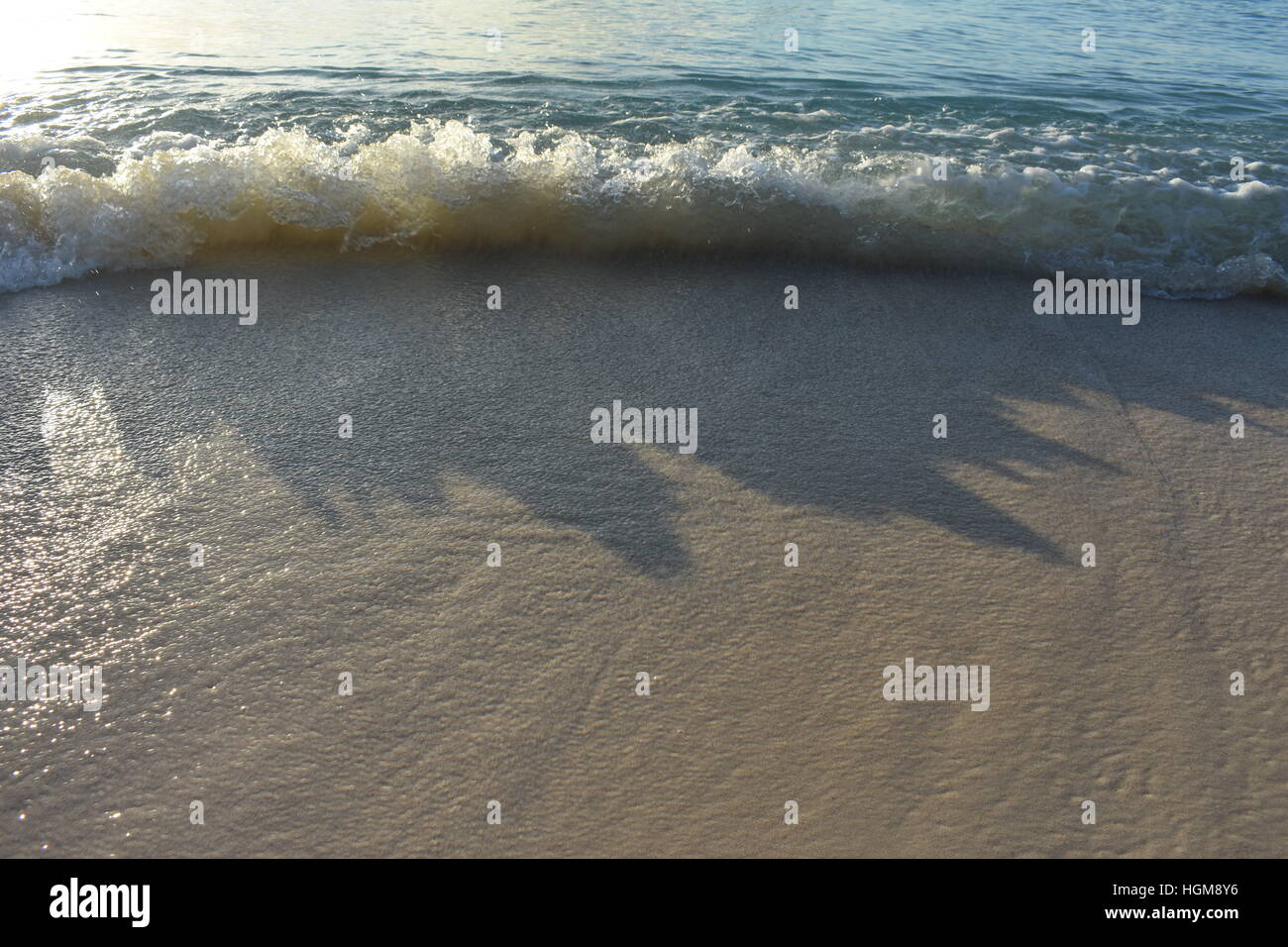 waves lapping beach Stock Photo - Alamy