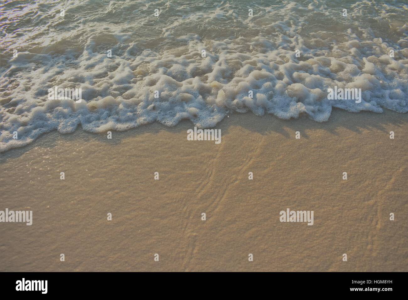 waves lapping beach Stock Photo - Alamy