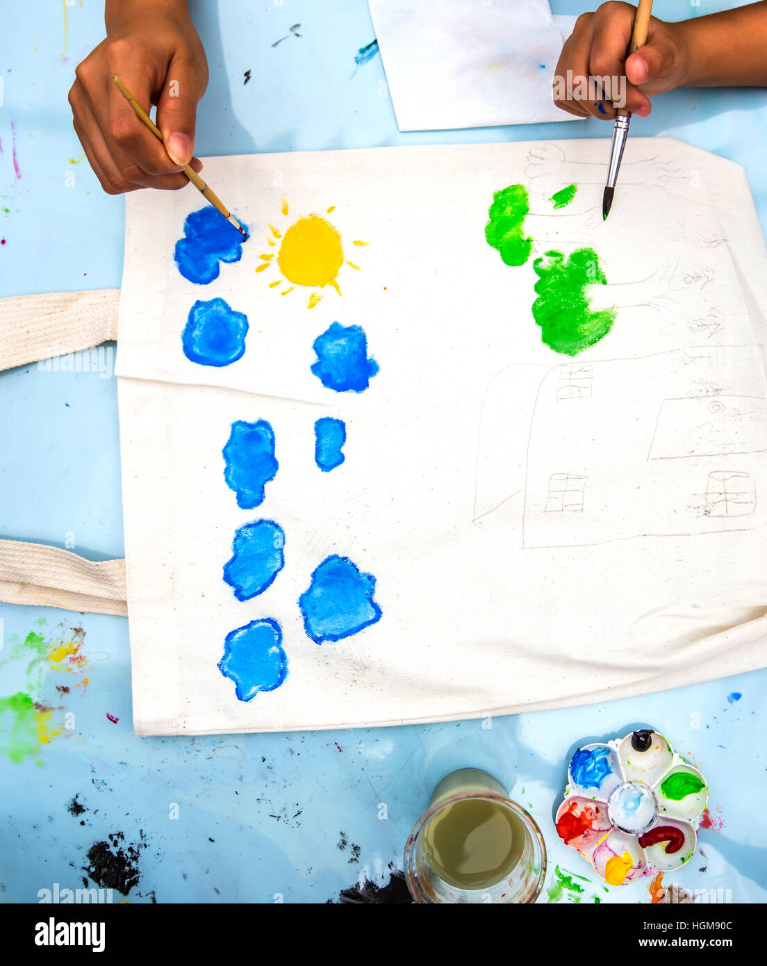 Mixing Water Colors in a painting Class Stock Photo - Alamy