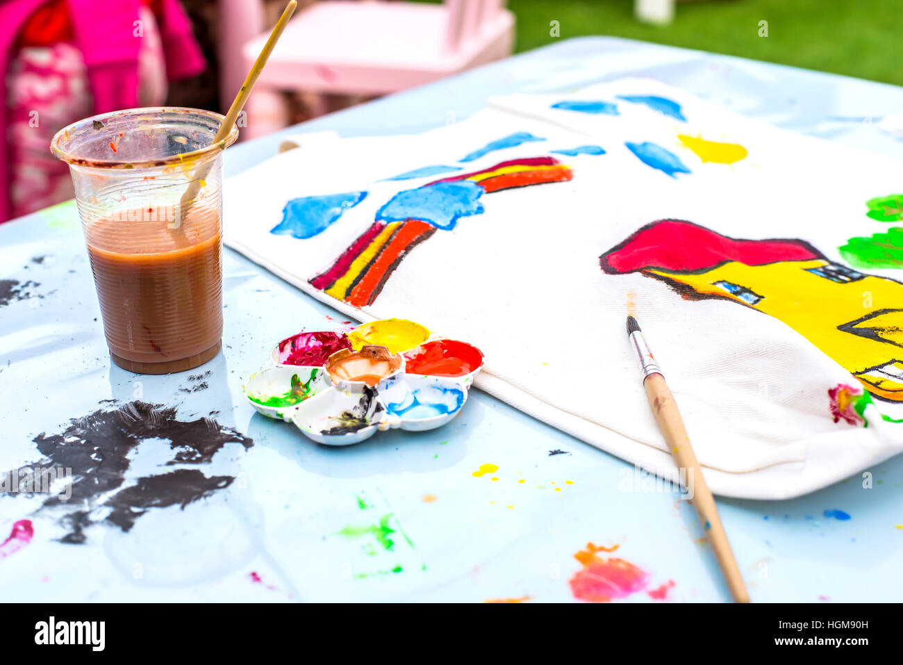 Mixing Water Colors in a painting Class Stock Photo - Alamy