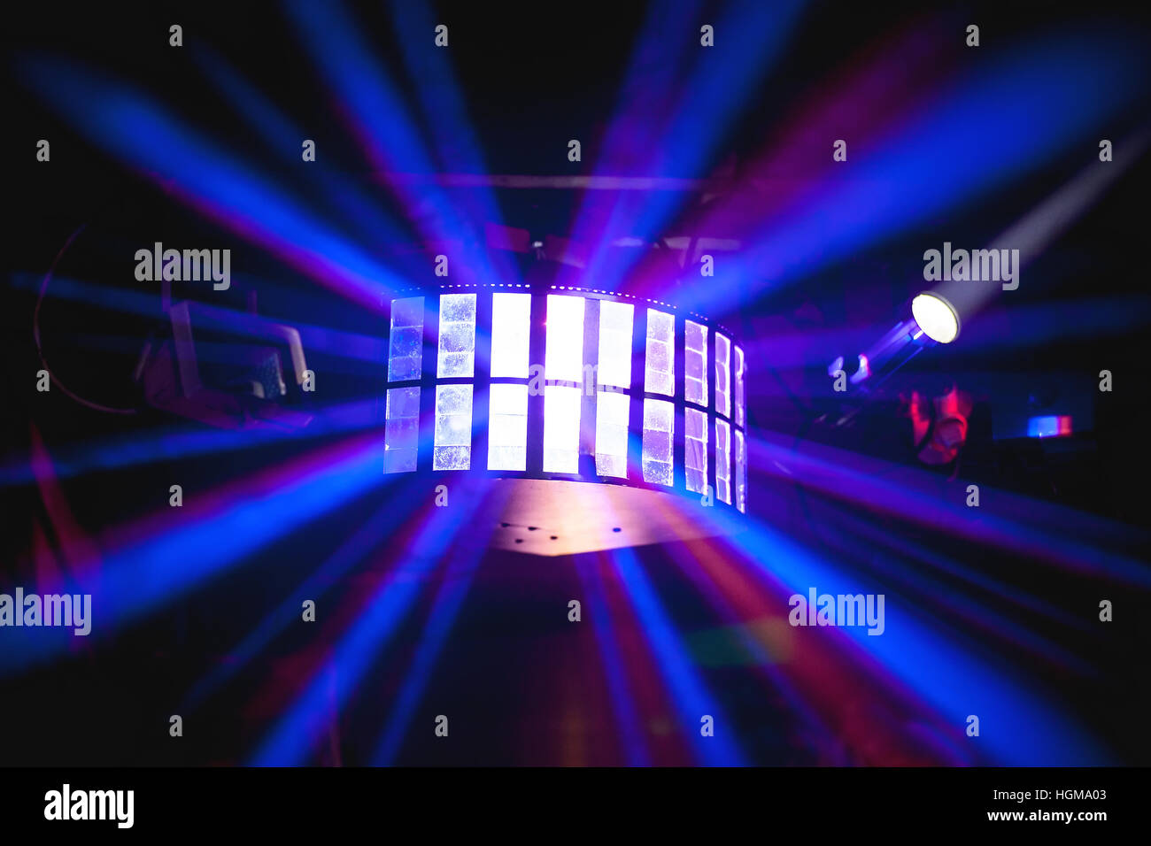 Details of a light equipment, blue light beams Stock Photo - Alamy