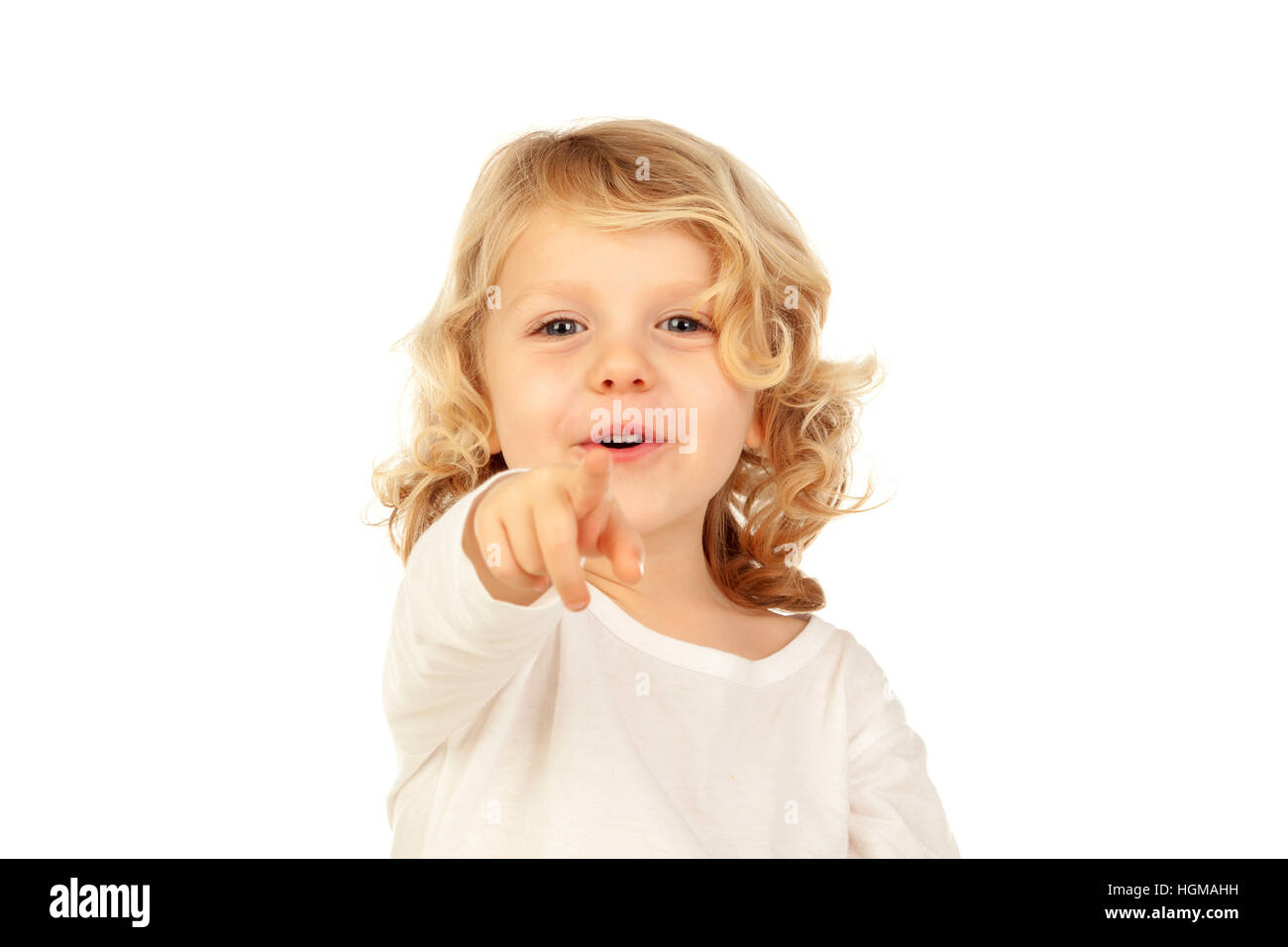 Cute kid pointing with his finger isolated on white background Stock ...