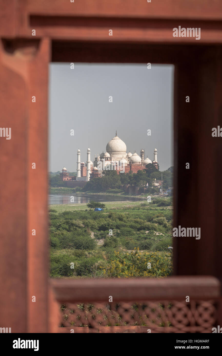 View of the Taj Mahal through an exterior window in the Agra Fort ...