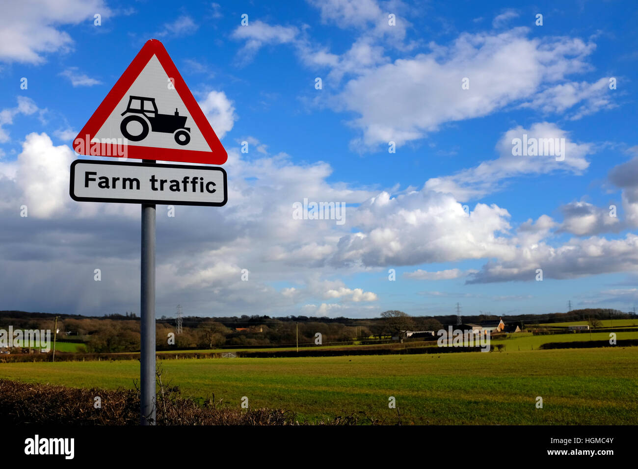 Rural road sign farm traffic fields sky clouds farming tractor logo ...