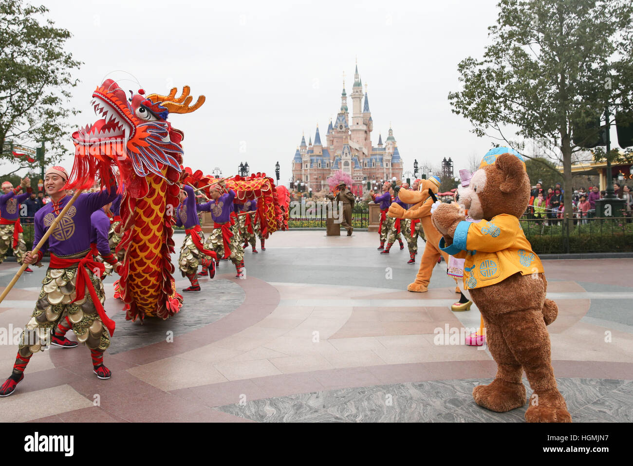 Shanghai, China. 11th Jan, 2017. Cartoon characters cheer for the ...