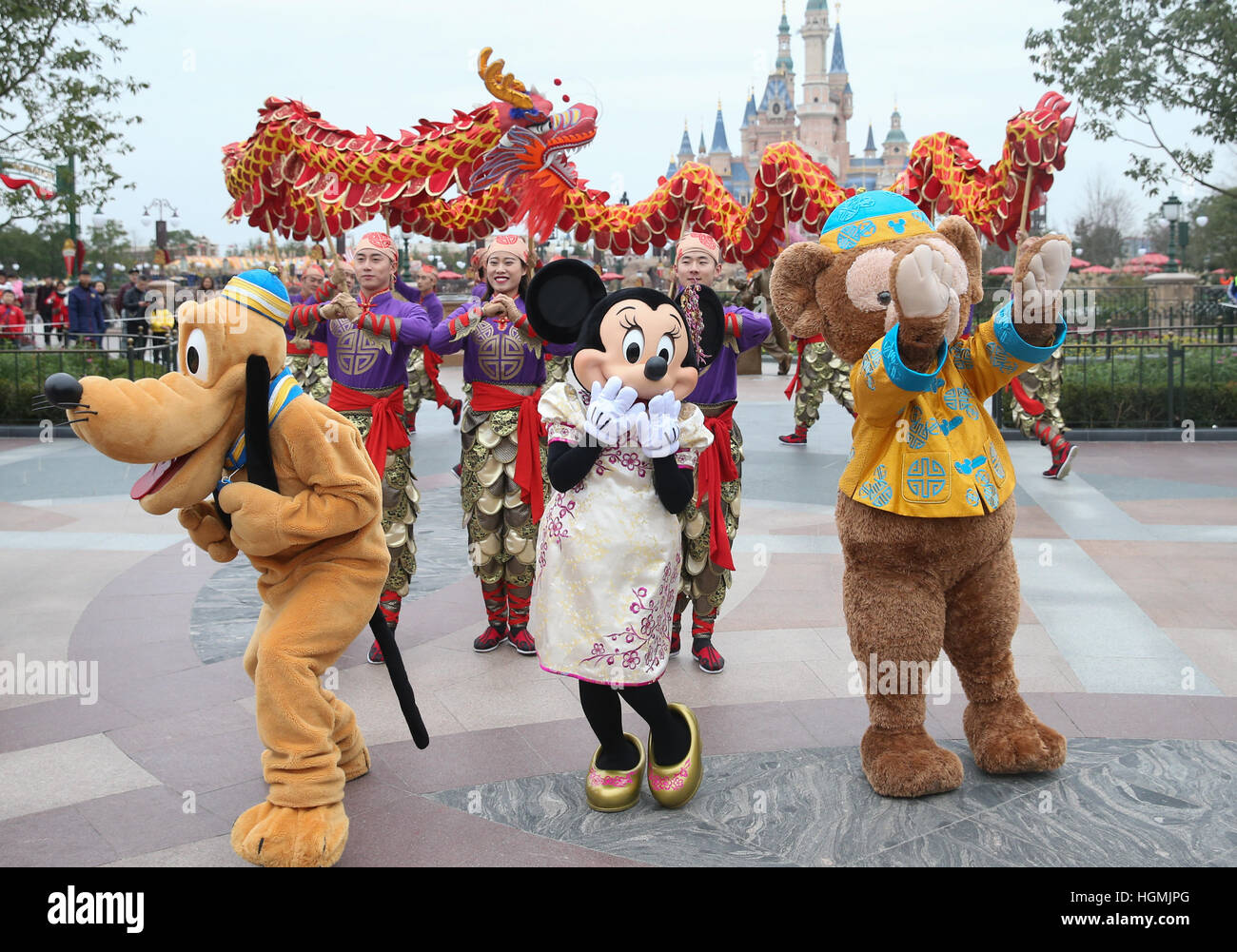 Shanghai, China. 11th Jan, 2017. Cartoon characters cheer for the ...