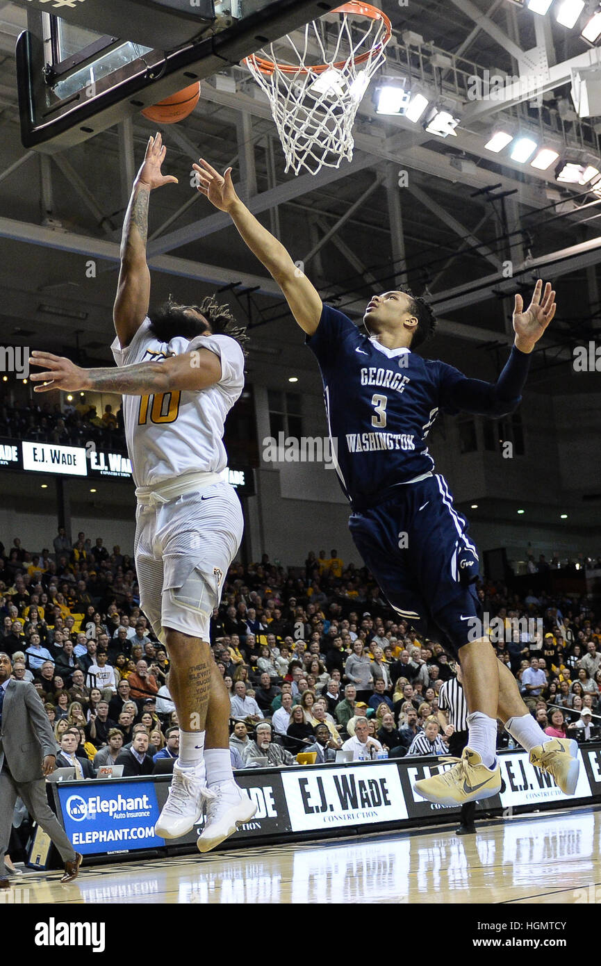 Virginia, USA. 11th Jan, 2017. JONATHAN WILLIAMS (10) shoots a layup ...