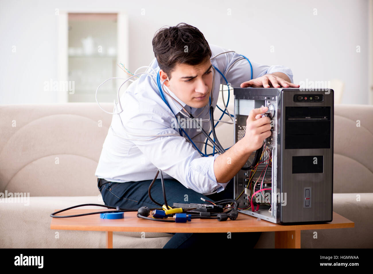 IT technician repairing broken pc desktop computer Stock Photo - Alamy