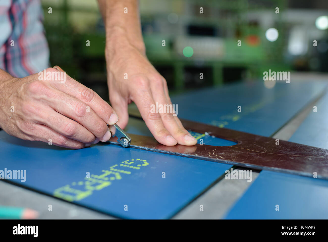 man cutting panels Stock Photo - Alamy