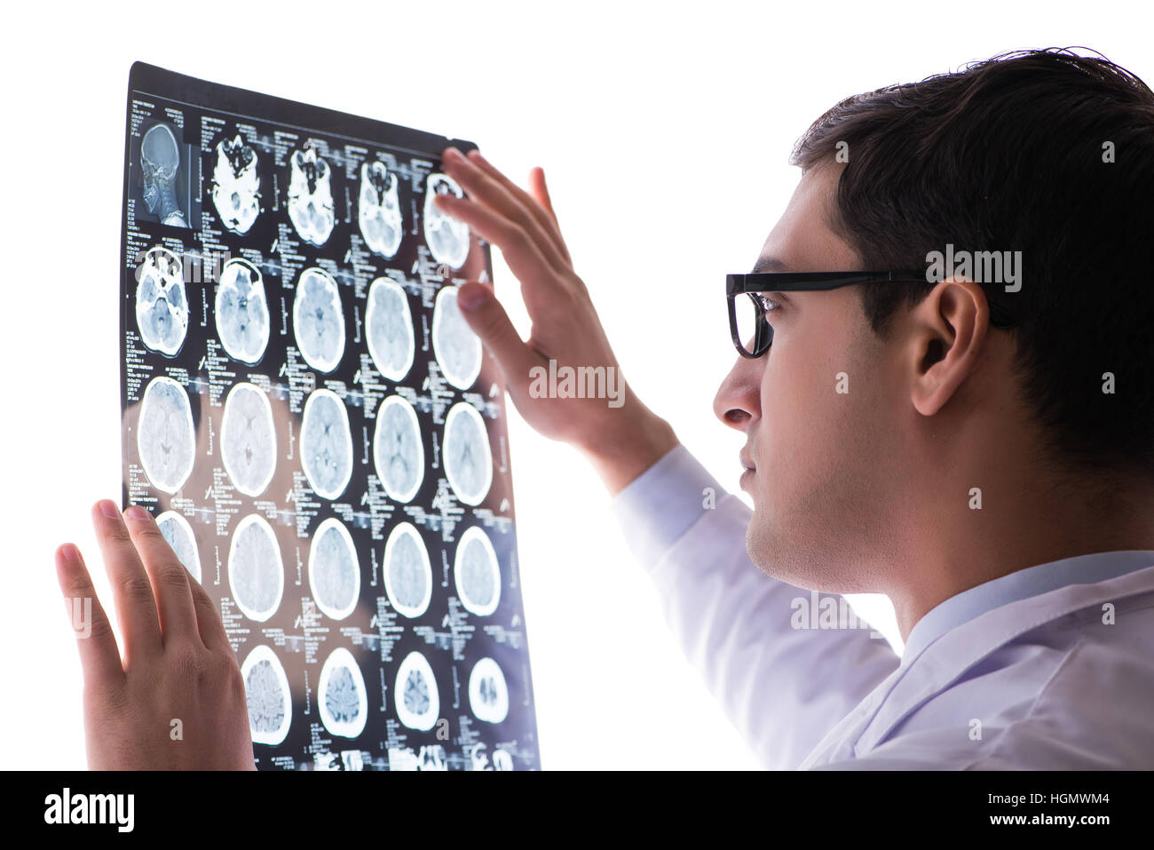 Young doctor looking at computer tomography x-ray image Stock Photo - Alamy