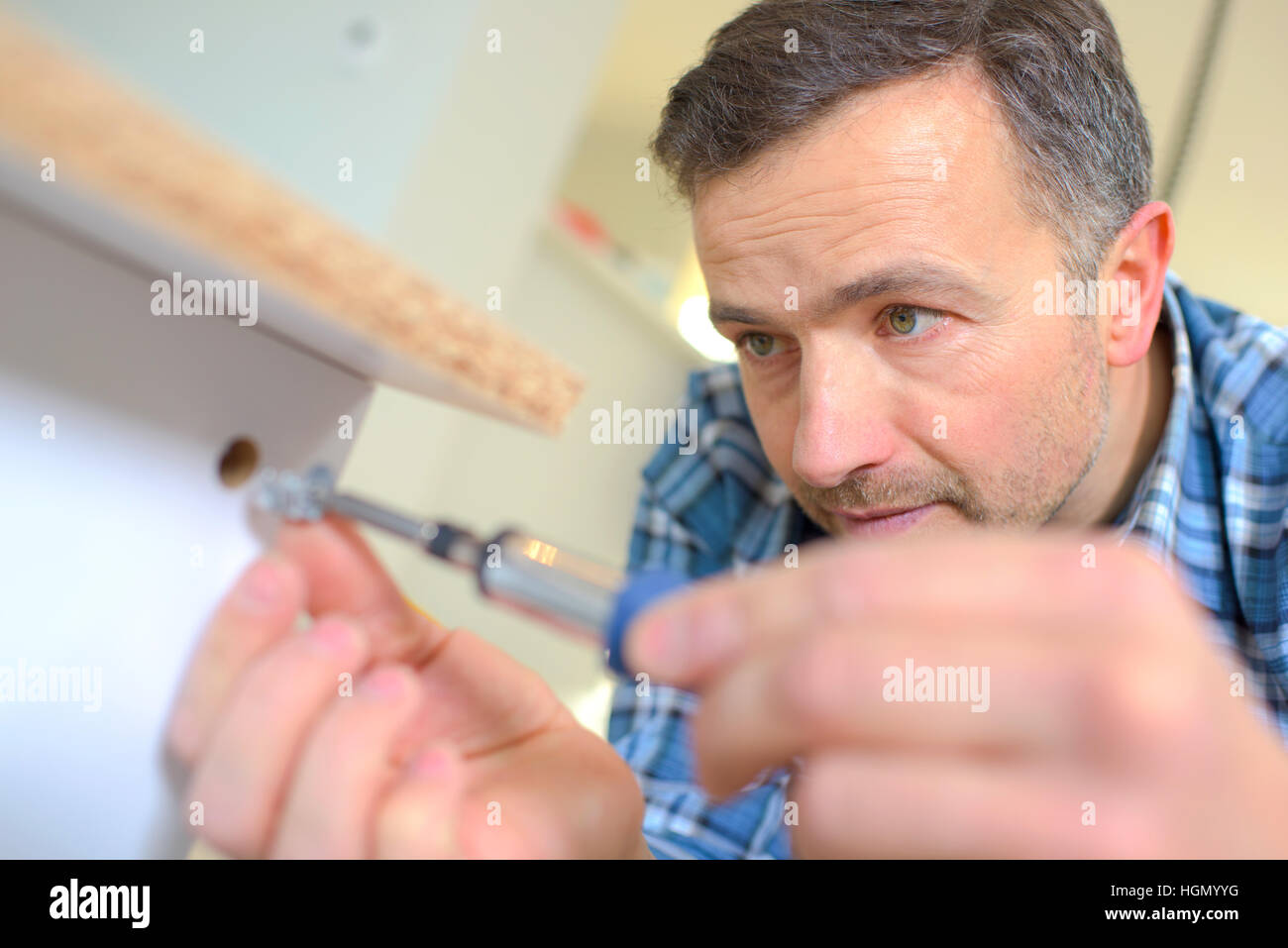 screwing to connect Stock Photo - Alamy