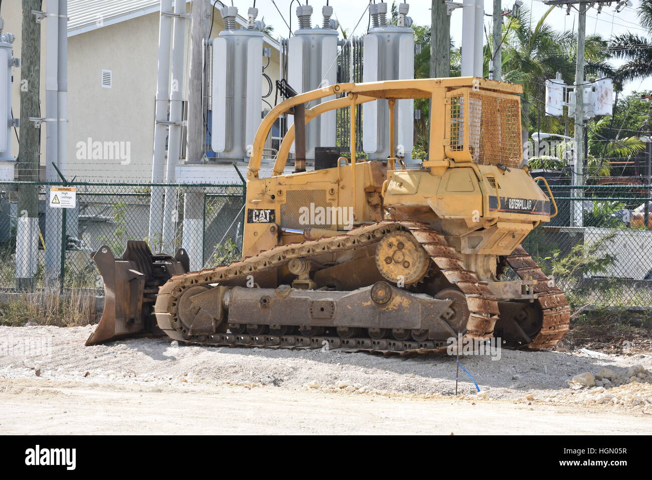 industrial track digger by the road side Stock Photo - Alamy