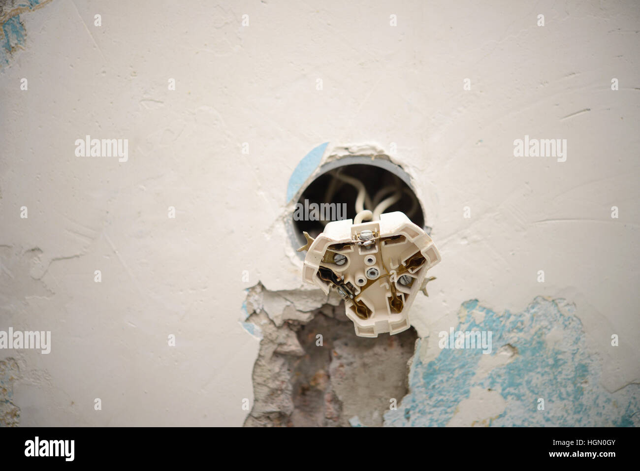 Damaged plug of abandoned building Stock Photo - Alamy