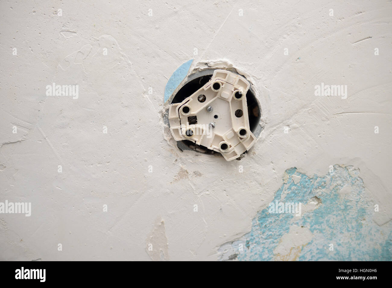 Damaged plug of abandoned building Stock Photo - Alamy
