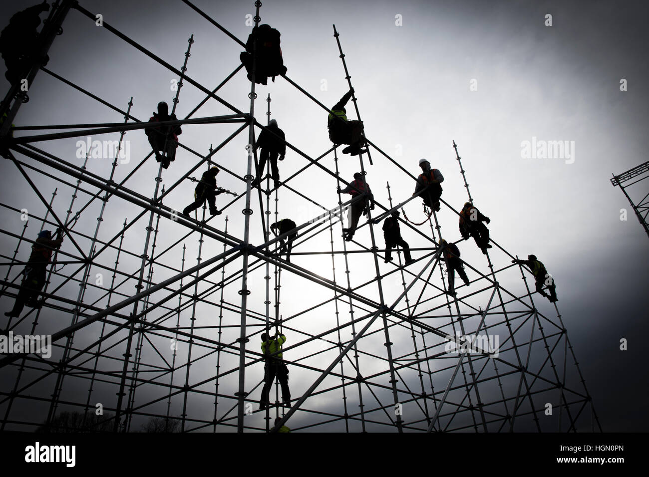 At the Lincoln Memorial in Washington, DC, workers build a tower for ...