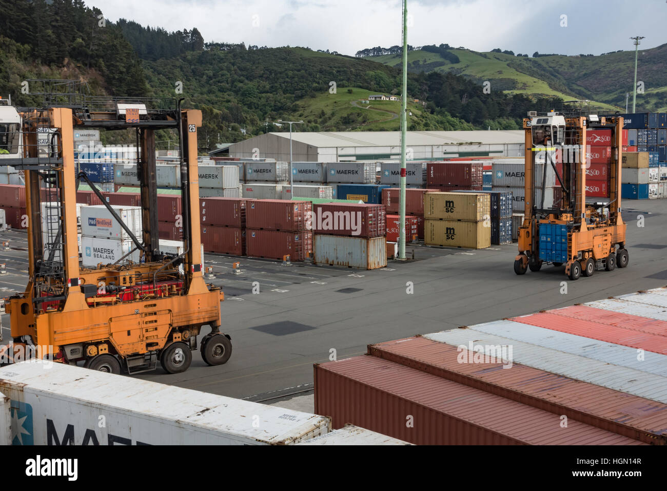 Freight handling of containers at Port Chalmers, Otago harbour, Dunedin ...