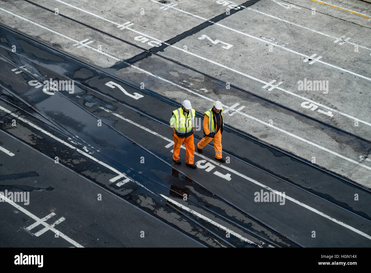 Workers on dock at container wharf at Port Chalmers, Otago harbour ...