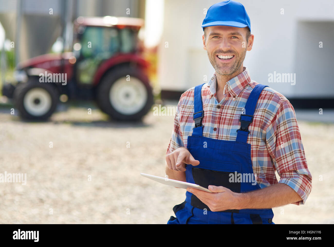 Farmer working tablet hi-res stock photography and images - Alamy