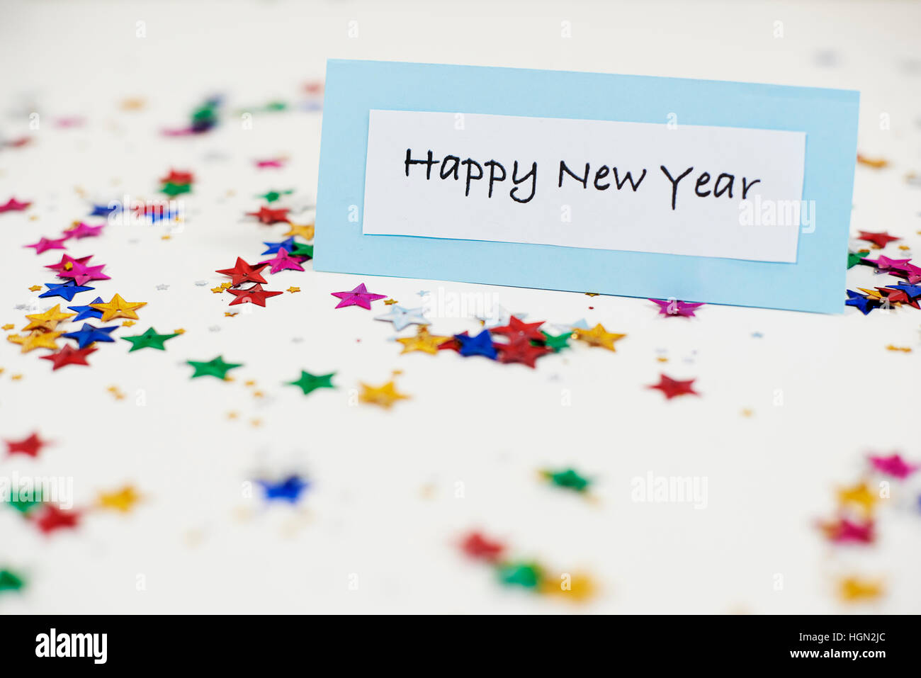 Small paper note showing joyful wishes Stock Photo - Alamy