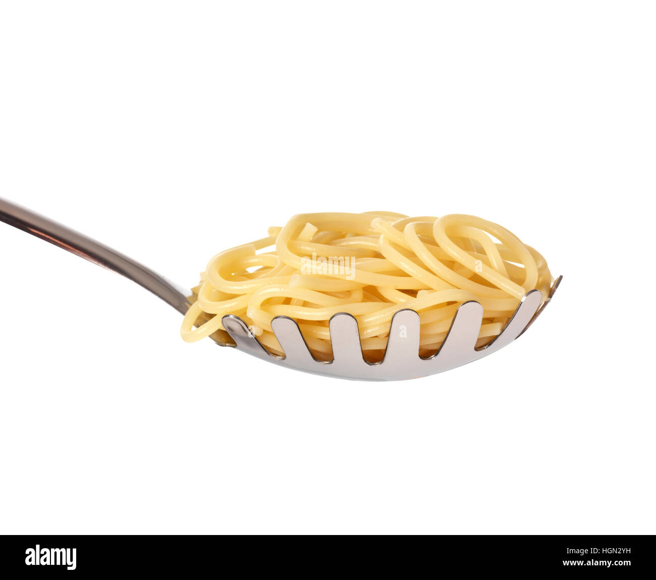Isolated Pasta on a serving spoon Stock Photo - Alamy