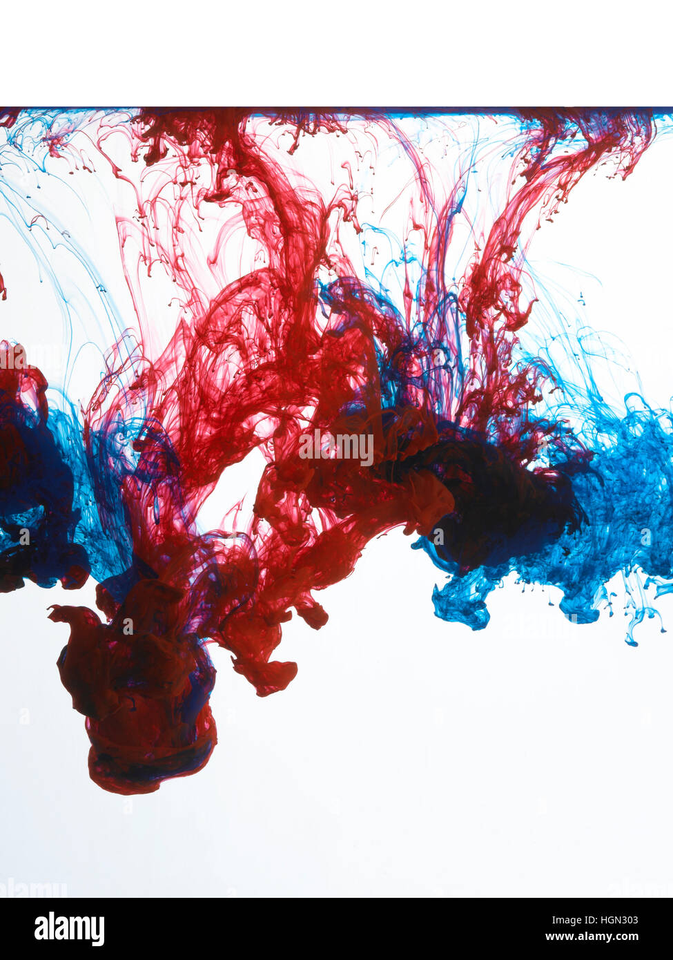 Blue ink isolated in water Stock Photo - Alamy