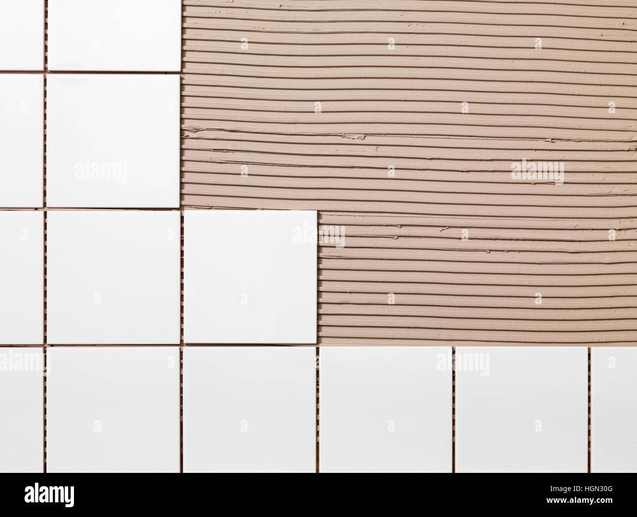 Tile Adhesive and tiles Stock Photo - Alamy