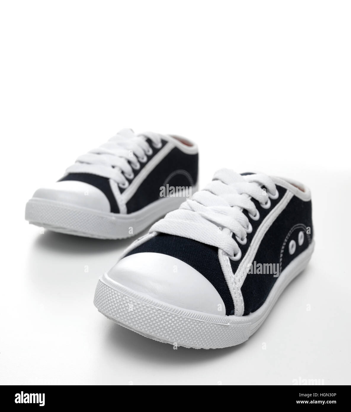 pair of trainers on a studio shot white background Stock Photo - Alamy