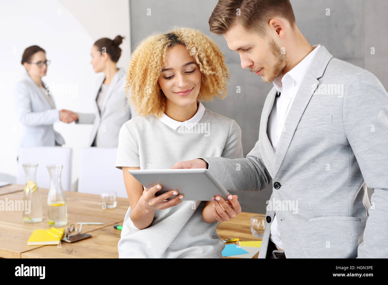 Business consultants while working in a team. The team of employees at ...