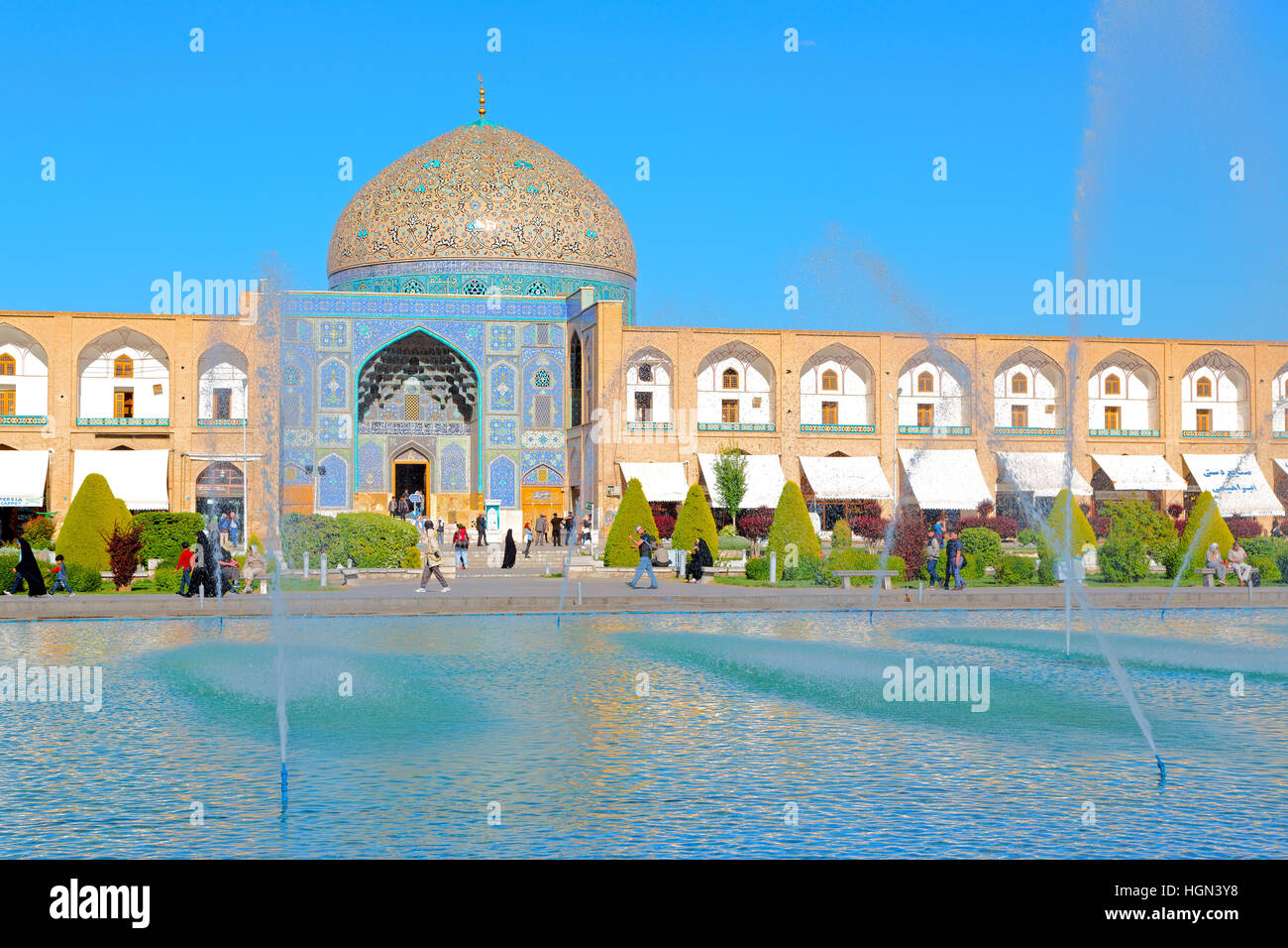in iran old square mosque and fountain water backlight Stock Photo - Alamy