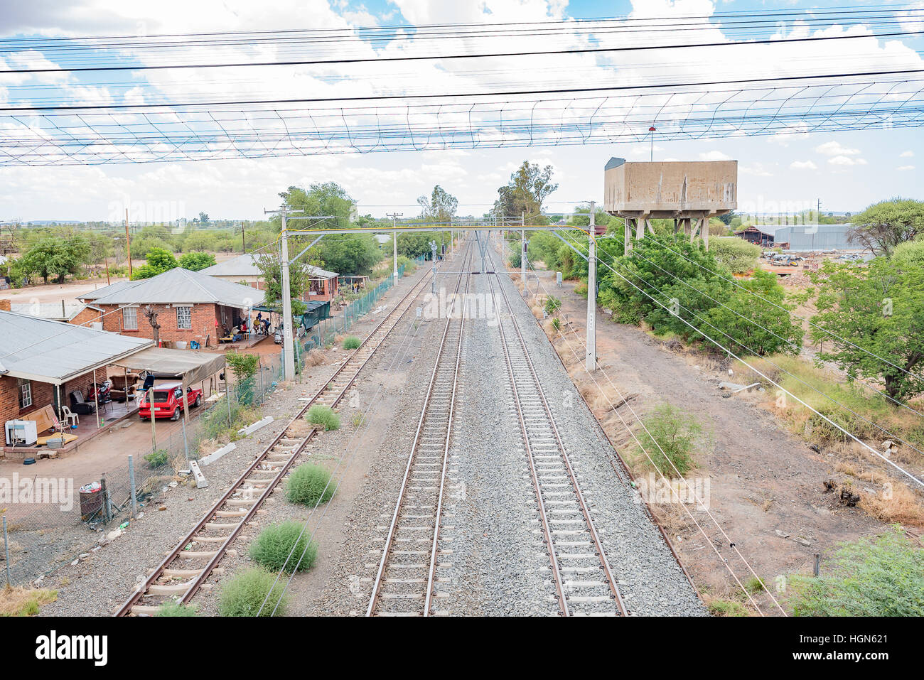 MODDERRIVIER, SOUTH AFRICA - DECEMBER 25, 2016: Houses and a reservoir ...