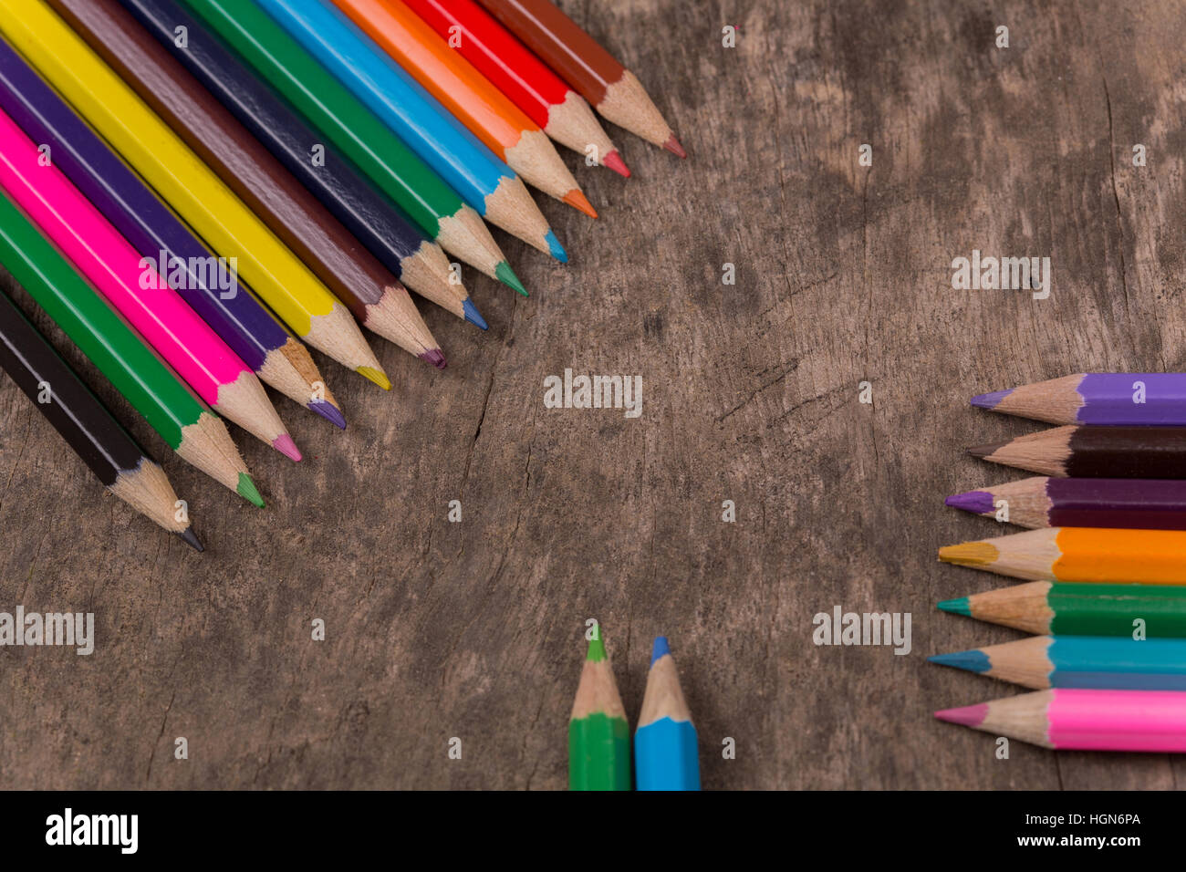 Wooden colorful pencils on a old wooden background Stock Photo - Alamy