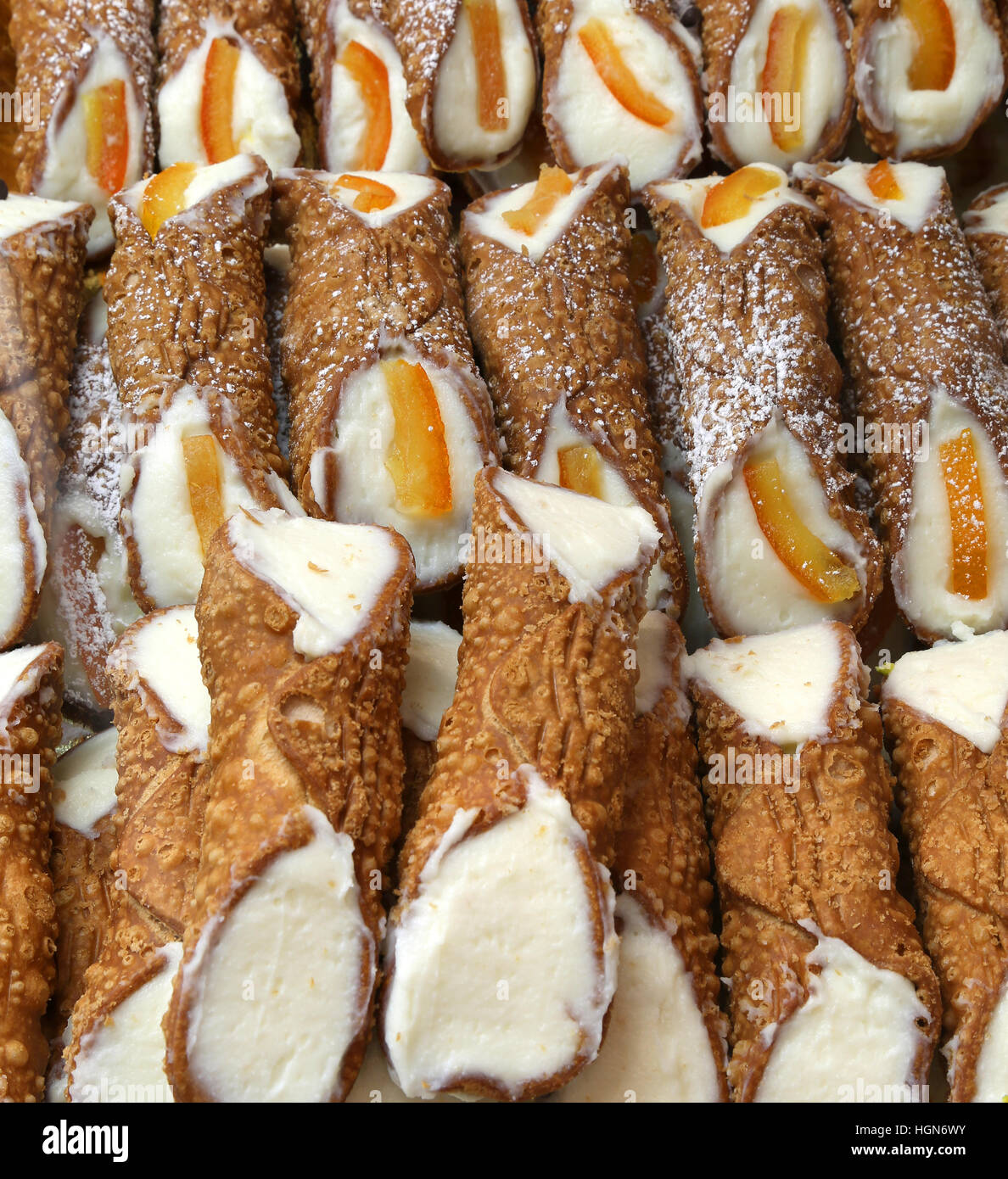 Sicilian pastry with many cannoli with ricotta cheese and slices of ...
