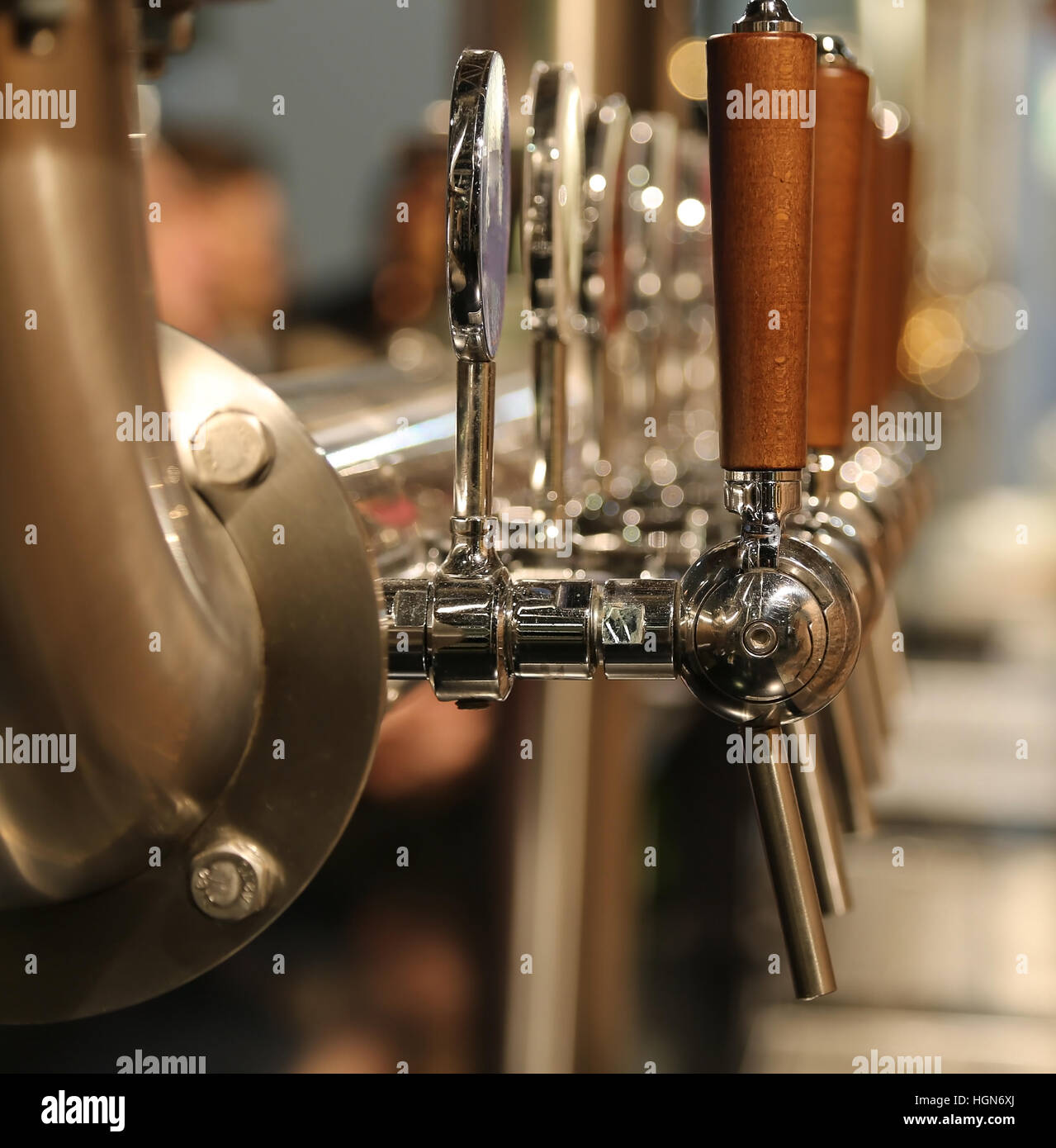 many taps for draft beer in the pub of london Stock Photo - Alamy
