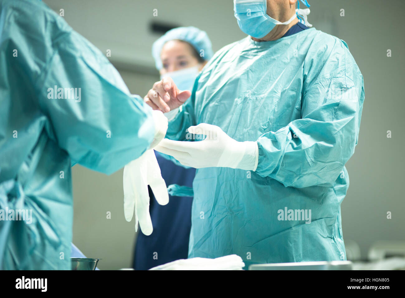 Surgeon in hospital surgery in sterile uniform "scrubs" in operating ...