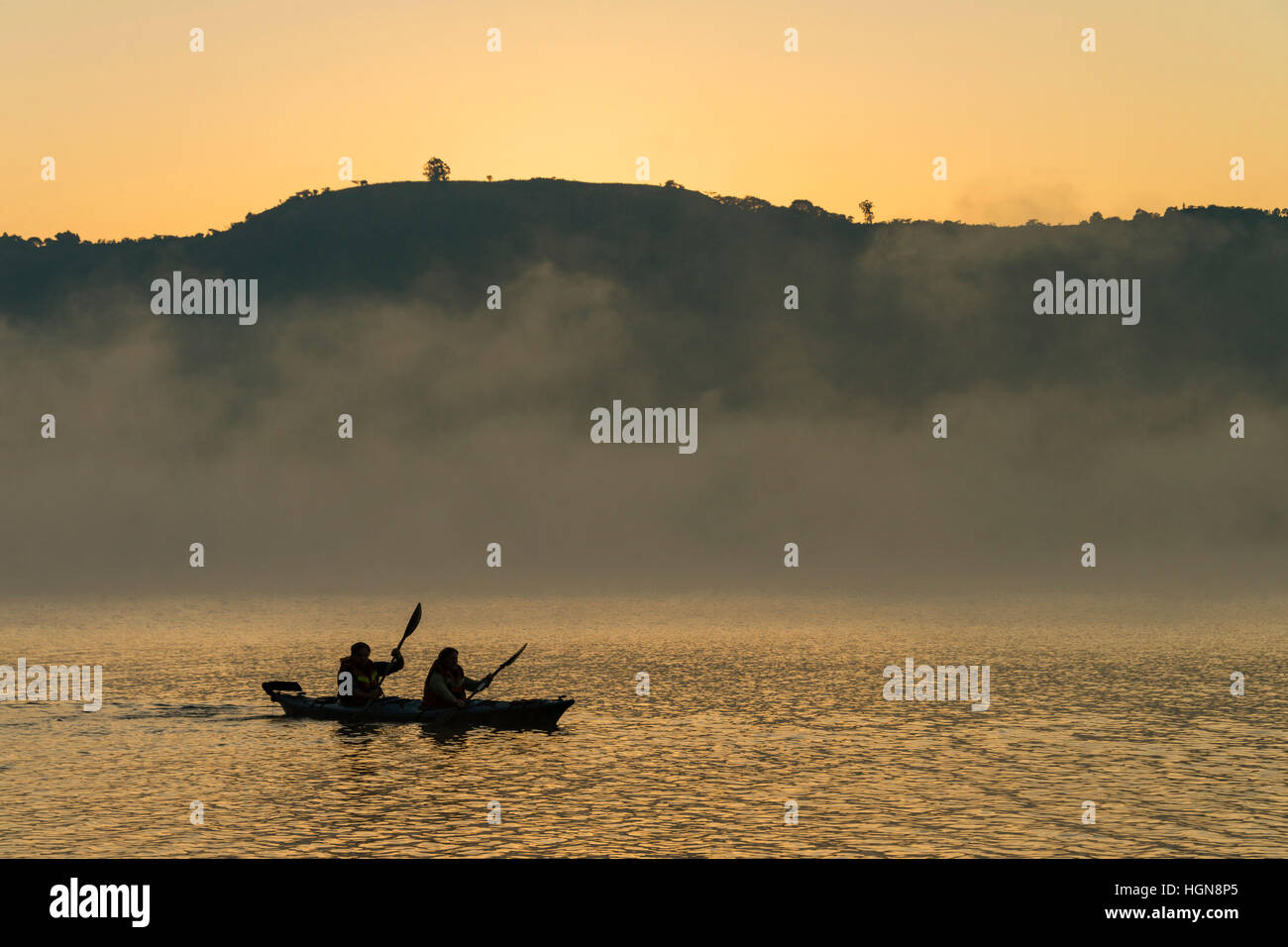 canoe kayak early morning dawn sunrise golden gold Stock Photo - Alamy