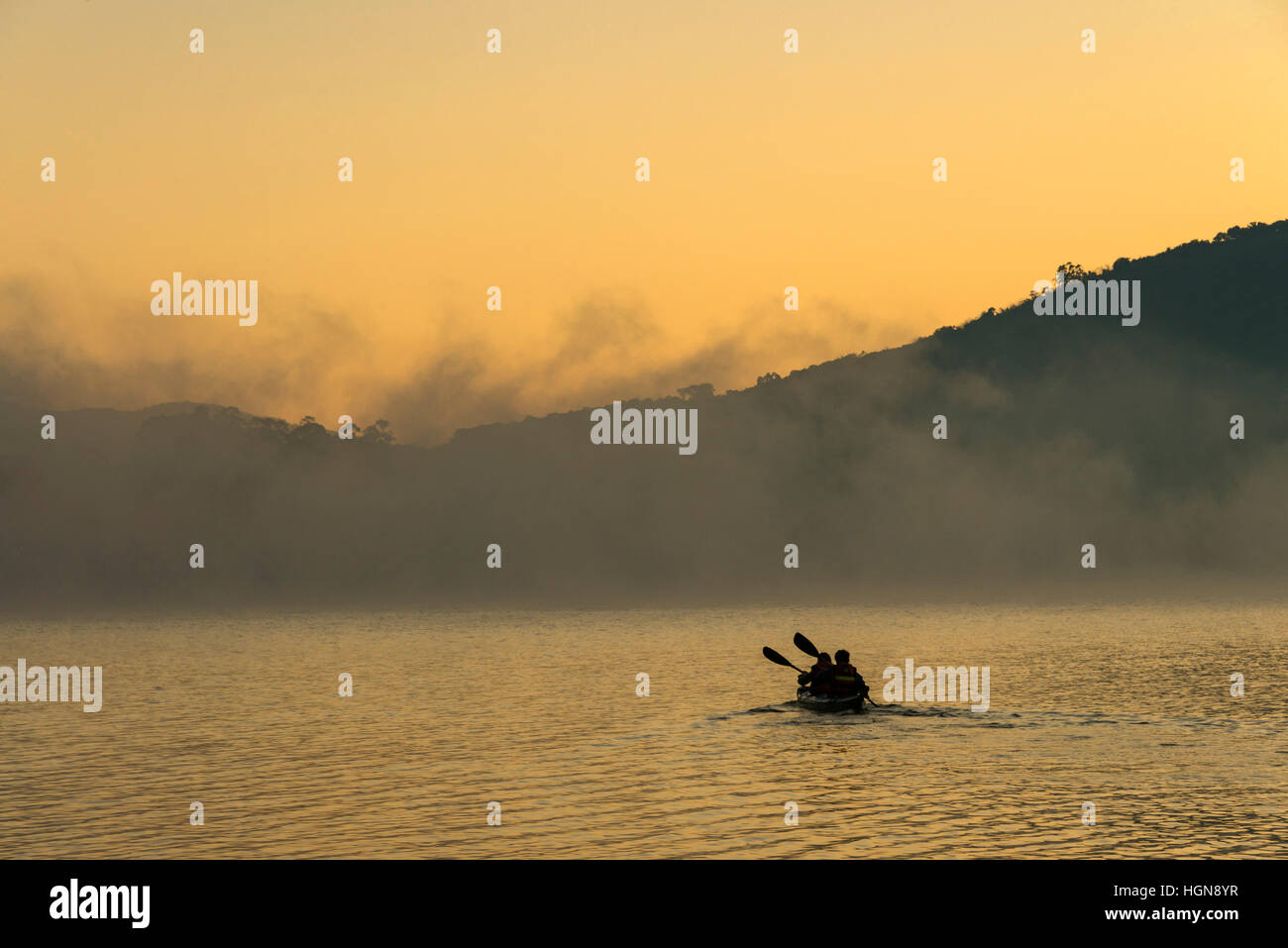 canoe kayak early morning dawn sunrise golden gold Stock Photo - Alamy