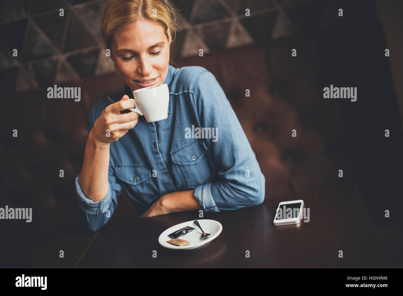 Attractive young woman sitting bar hi-res stock photography and images ...