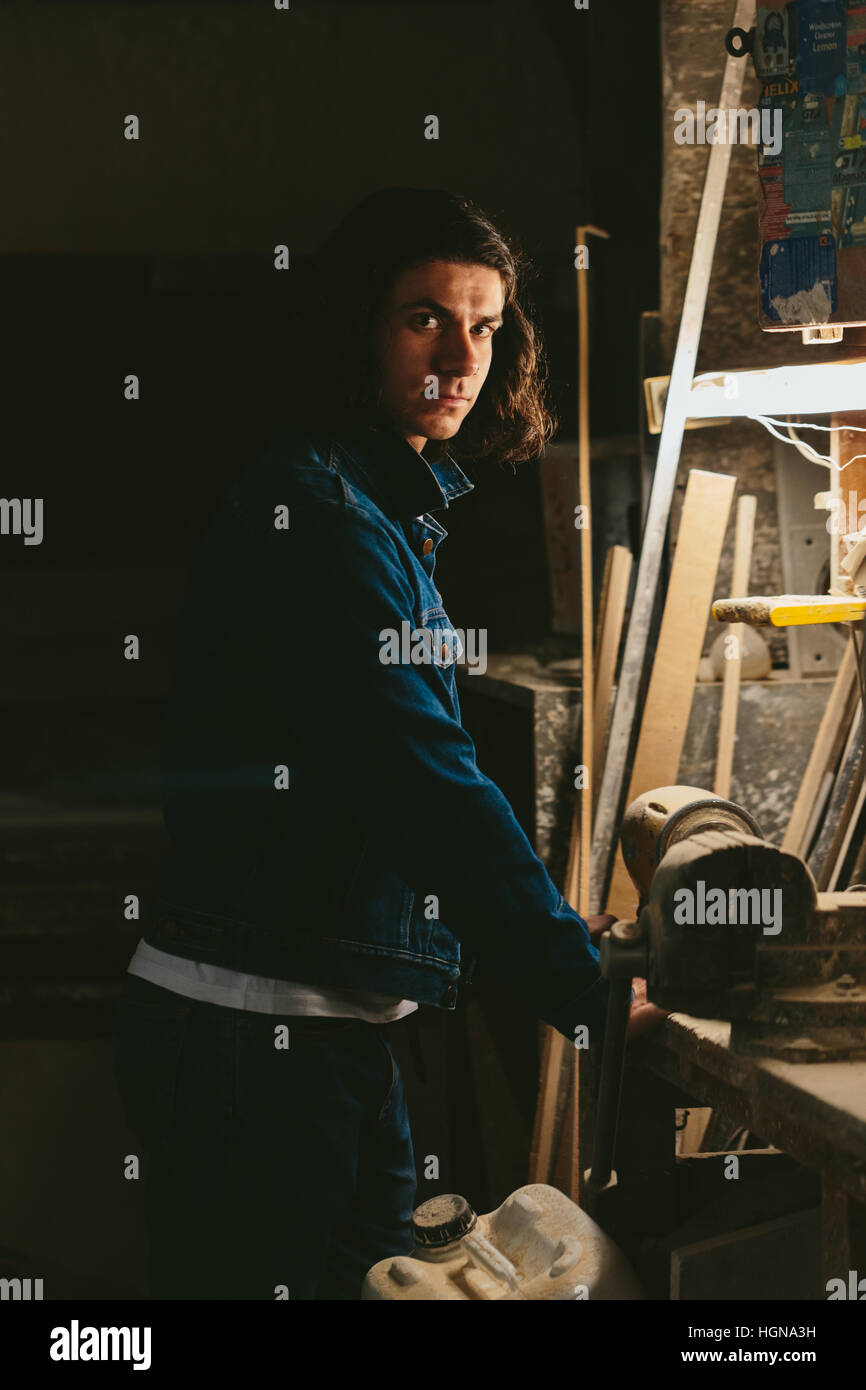 Working at his bench hi-res stock photography and images - Alamy