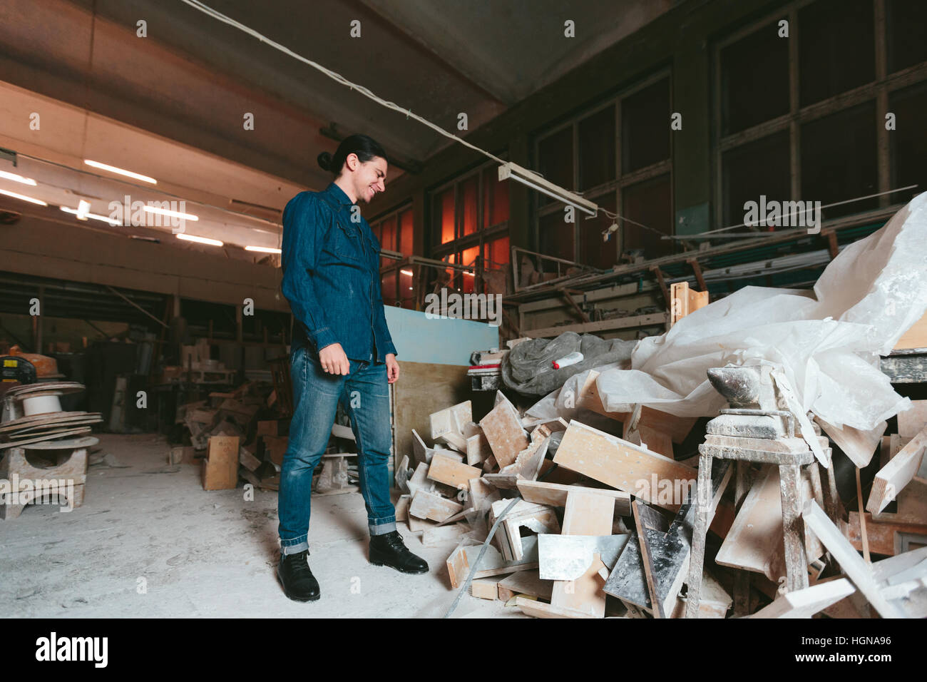 man in an old factory for the production of plaster molds Stock Photo ...