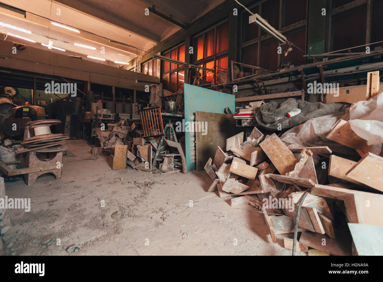 Factory for Production of plaster molds. cluttered dusty old warehouse ...