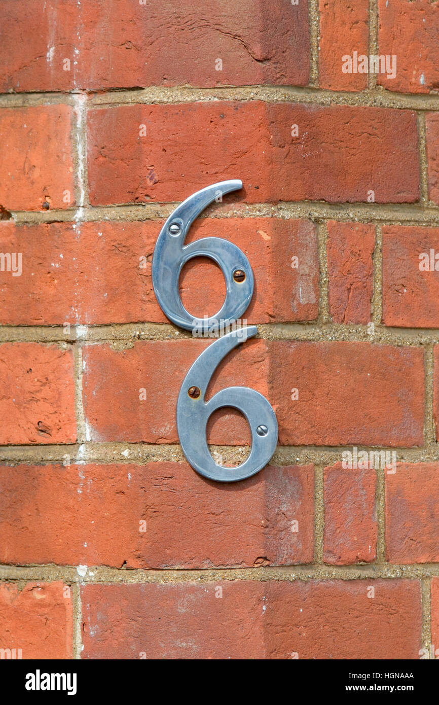 House Number 66 sign on wall Stock Photo - Alamy