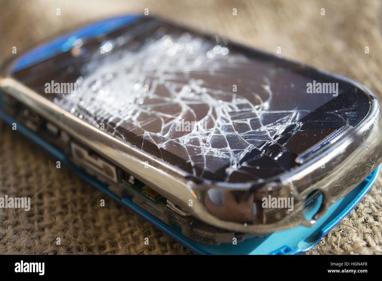 smartphone with broken screen Stock Photo - Alamy