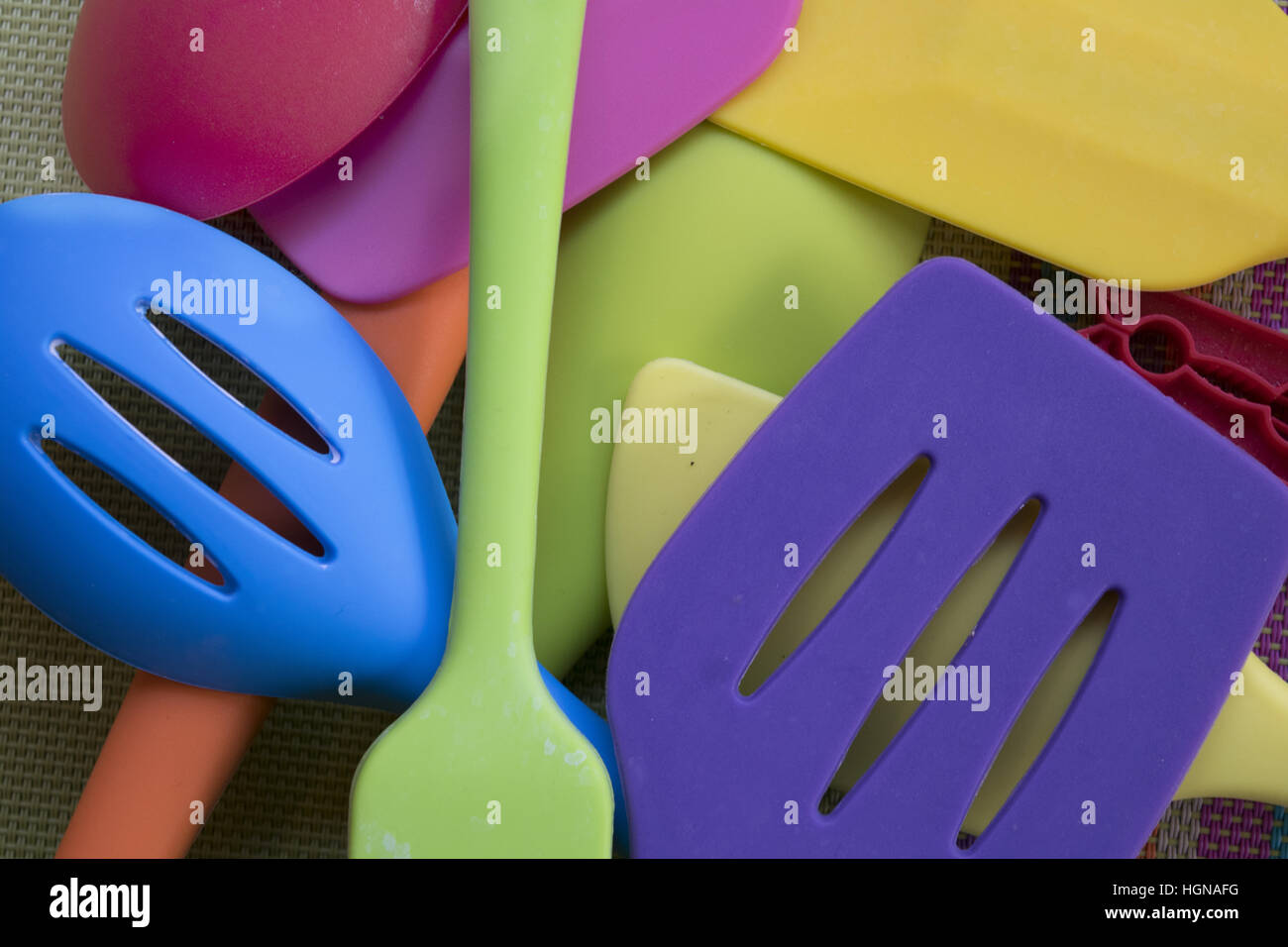 detail of colored plastic ladles Stock Photo - Alamy
